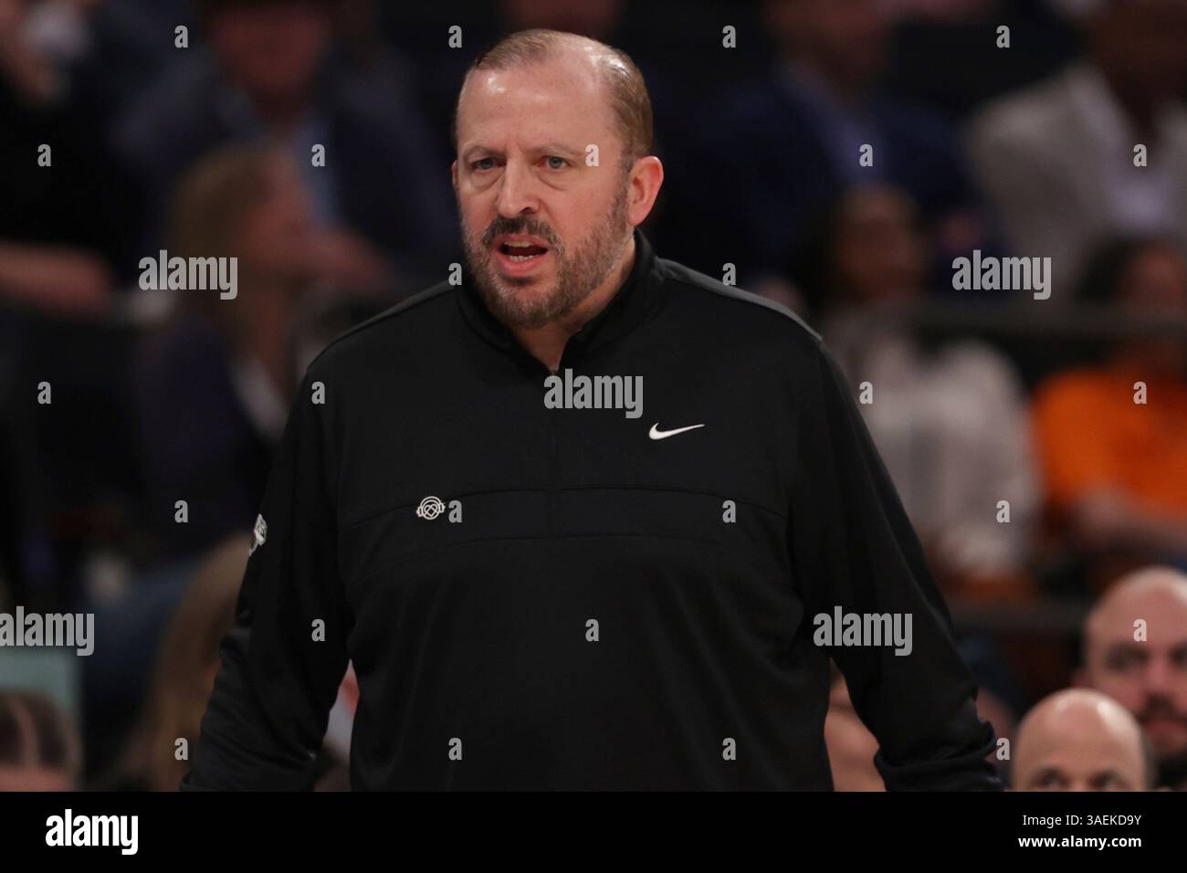 New York Knicks' head coach Tom Thibodeau stands on the court during ...