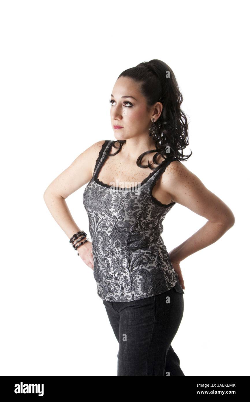 Beautiful caucasian female with ponytail wearing gray tank top and ...