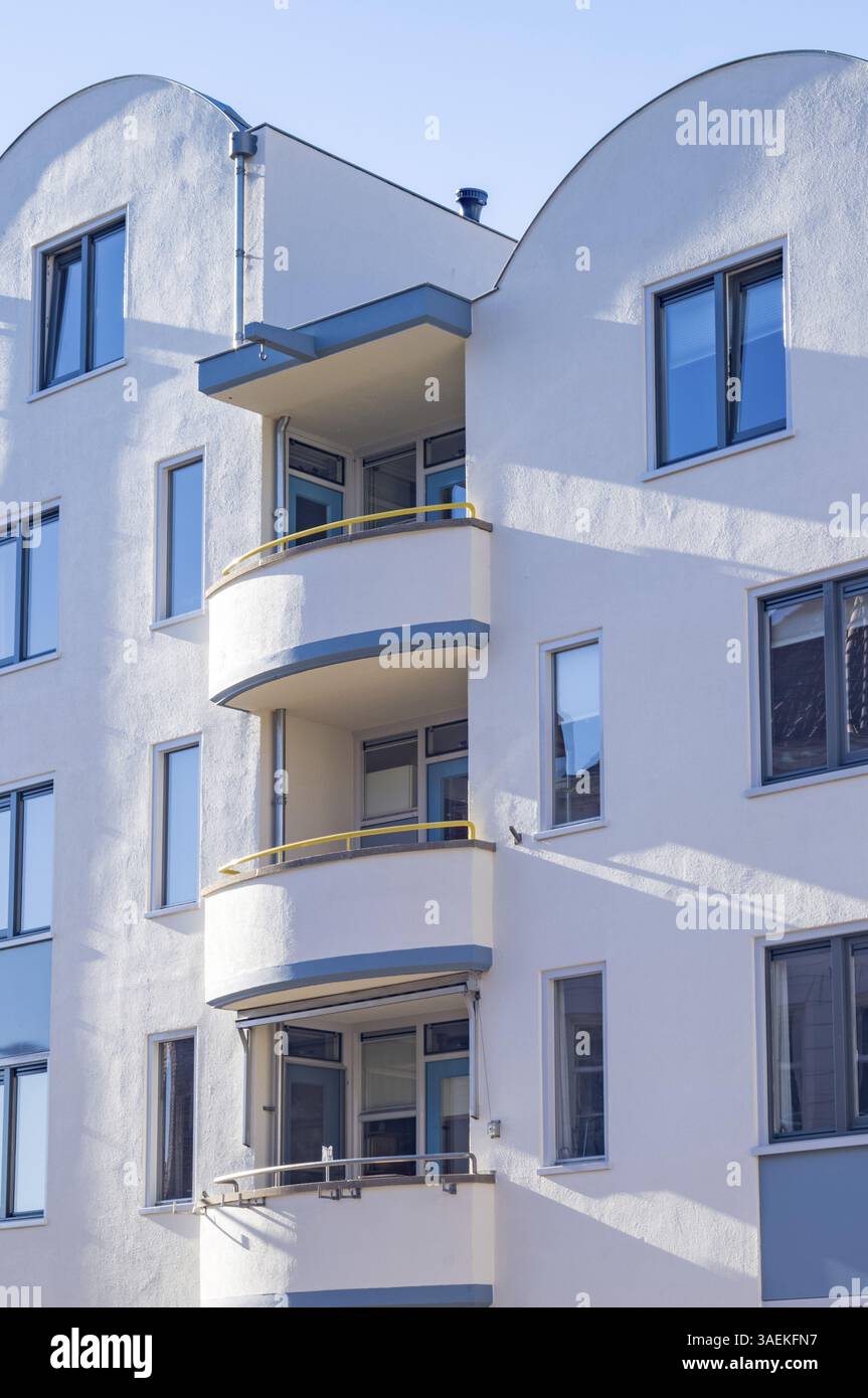 Modernist architecture featuring rounded balconies and windows in a ...