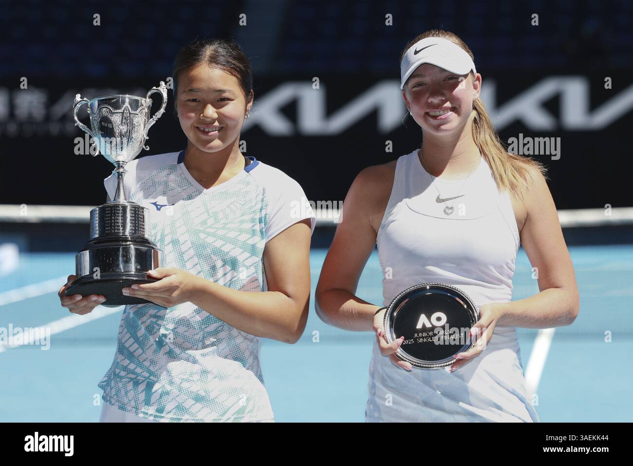 L-R. Japanese Junior Grand Slam winner Wakana Sonobe (JPN) holding up ...