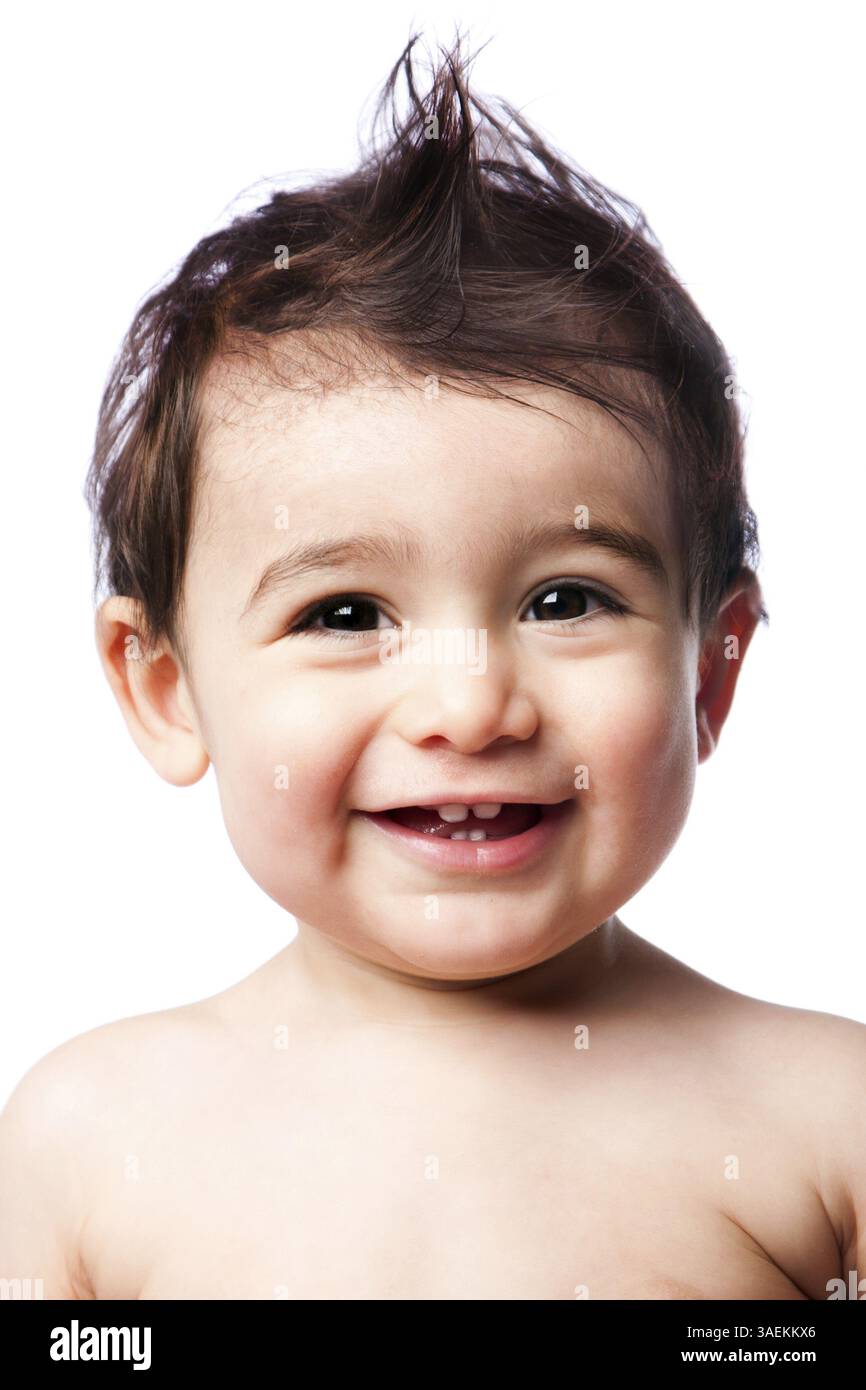Cute happy smiling teething baby toddler with mohawk hairstyle ...
