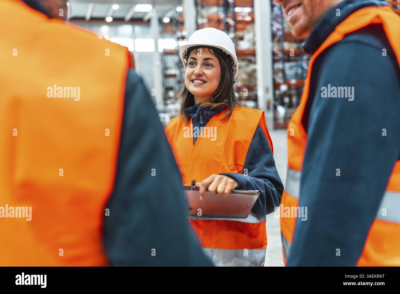 People wearing safety vests hi-res stock photography and images - Alamy