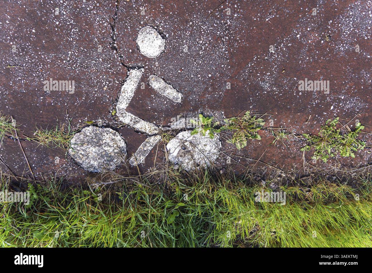 Damaged surface of bicycle lane. Abandoned cycle path, red bicycle road ...