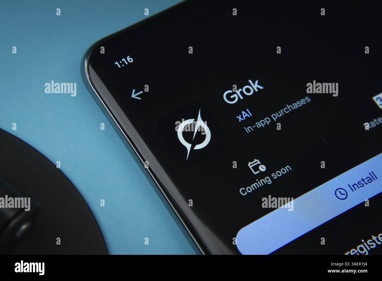 The Grok app from Google Playstore is displayed on a smartphone screen ...