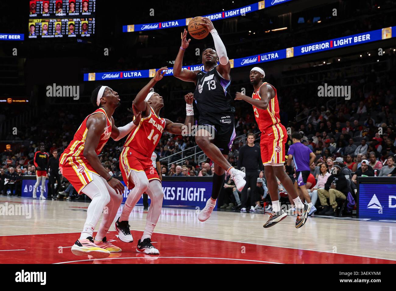 Utah Jazz guard Isaiah Collier (13) drives to the basket against ...