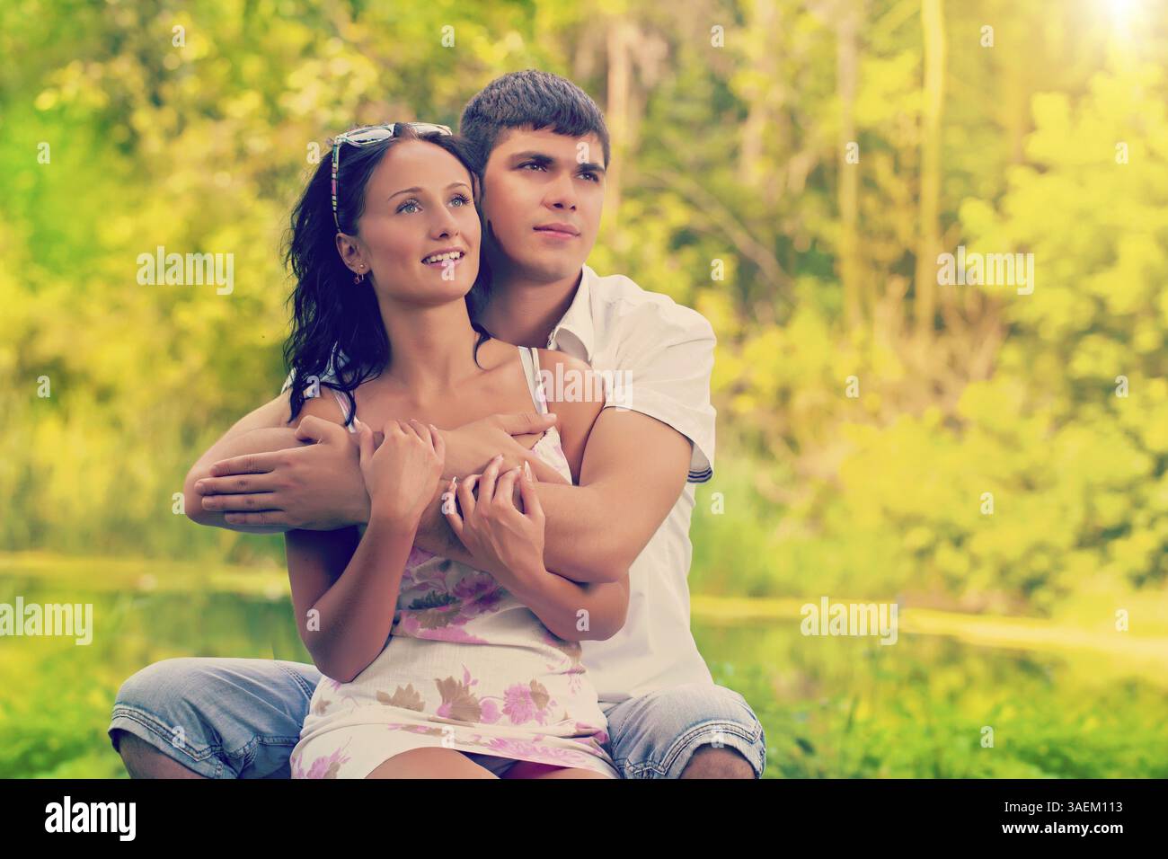 Couple on nature looking in a distance instagram color Stock Photo - Alamy