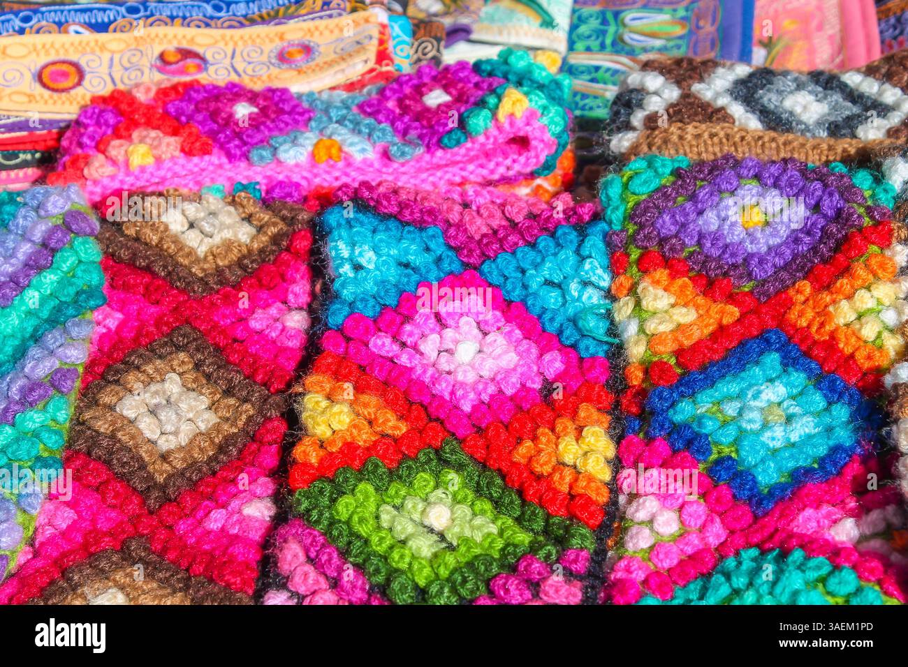 Peruvian traditional craft handmade dolls and textile. Colorful clothes ...