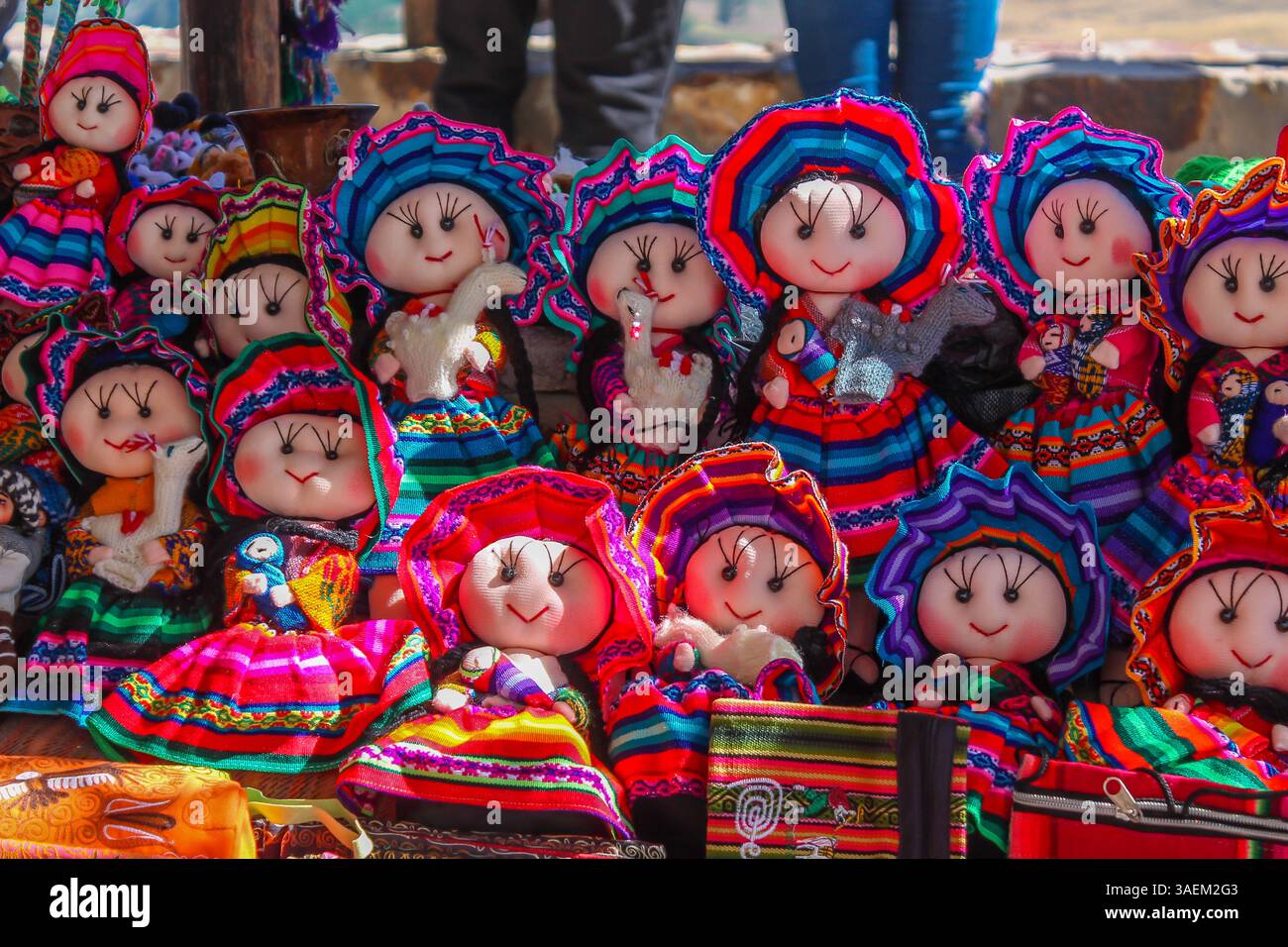 Peruvian traditional craft handmade dolls and textile. Colorful clothes ...
