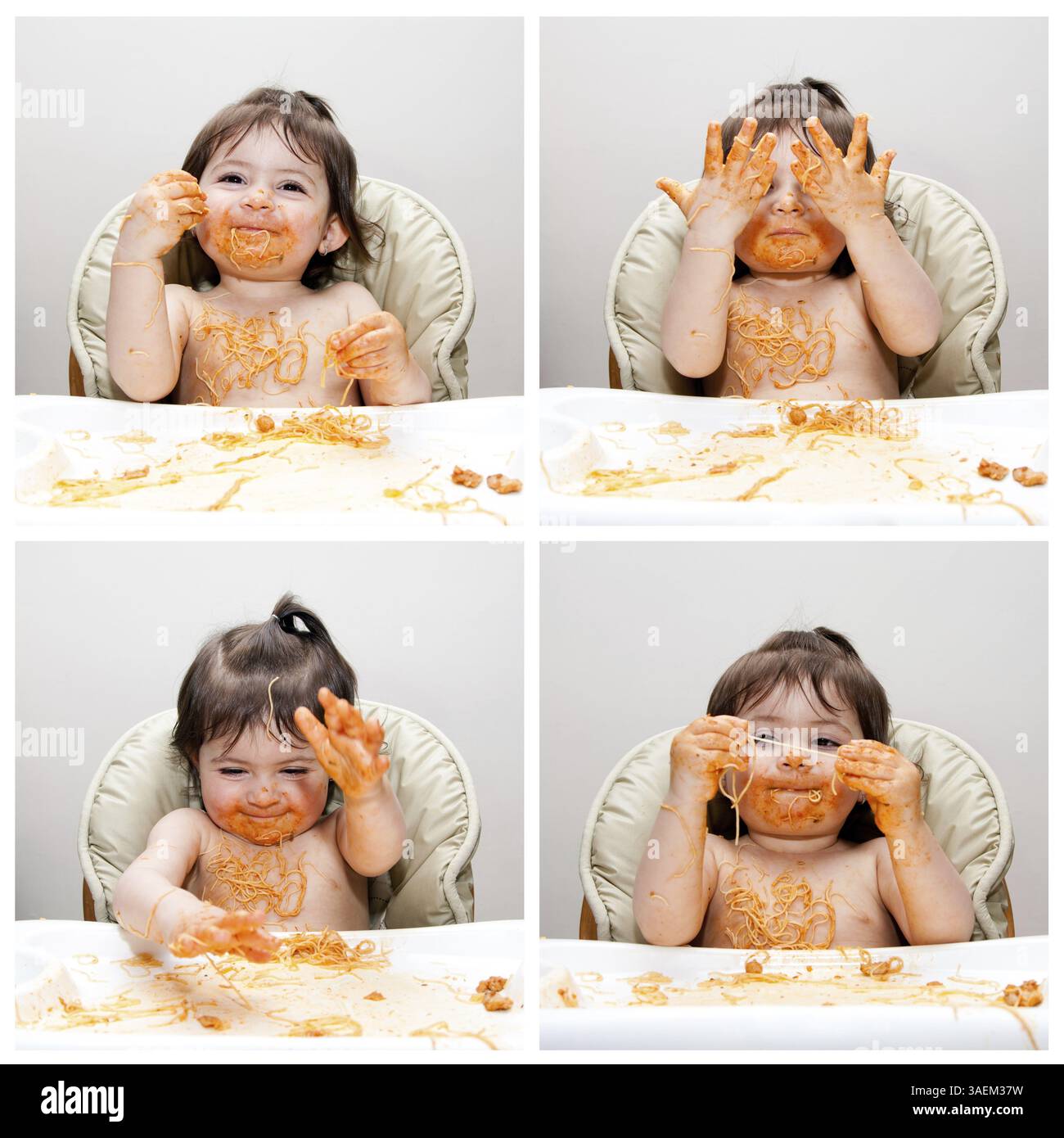 Happy baby having fun eating messy showing hands covered in Spaghetti ...