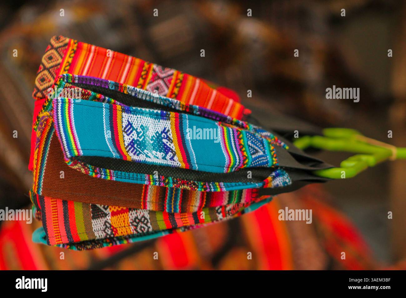 Peruvian traditional craft handmade dolls and textile. Colorful clothes ...