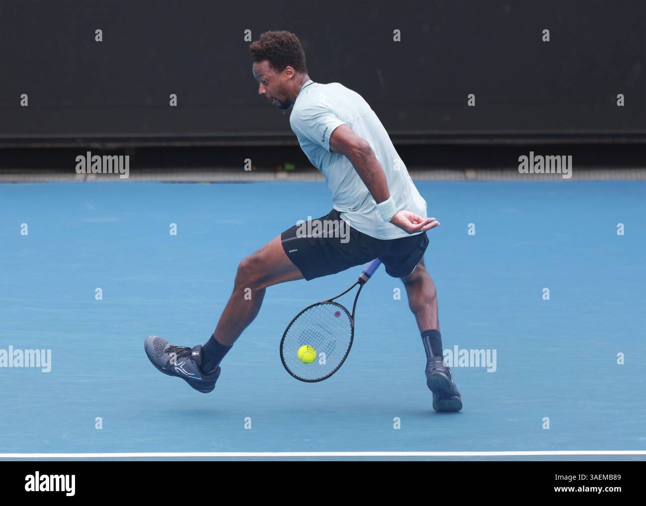 French tennis player Gael Monfils playing a tweener shot at the Australian Open 2025 tournament ...