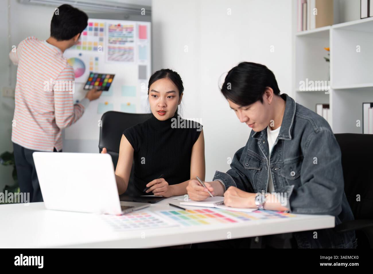 Creative Dialogue and Strategic Design. Two professionals discussing ...