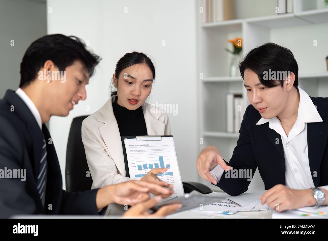 Data Presentation and Collaboration. Team members engaging in a ...