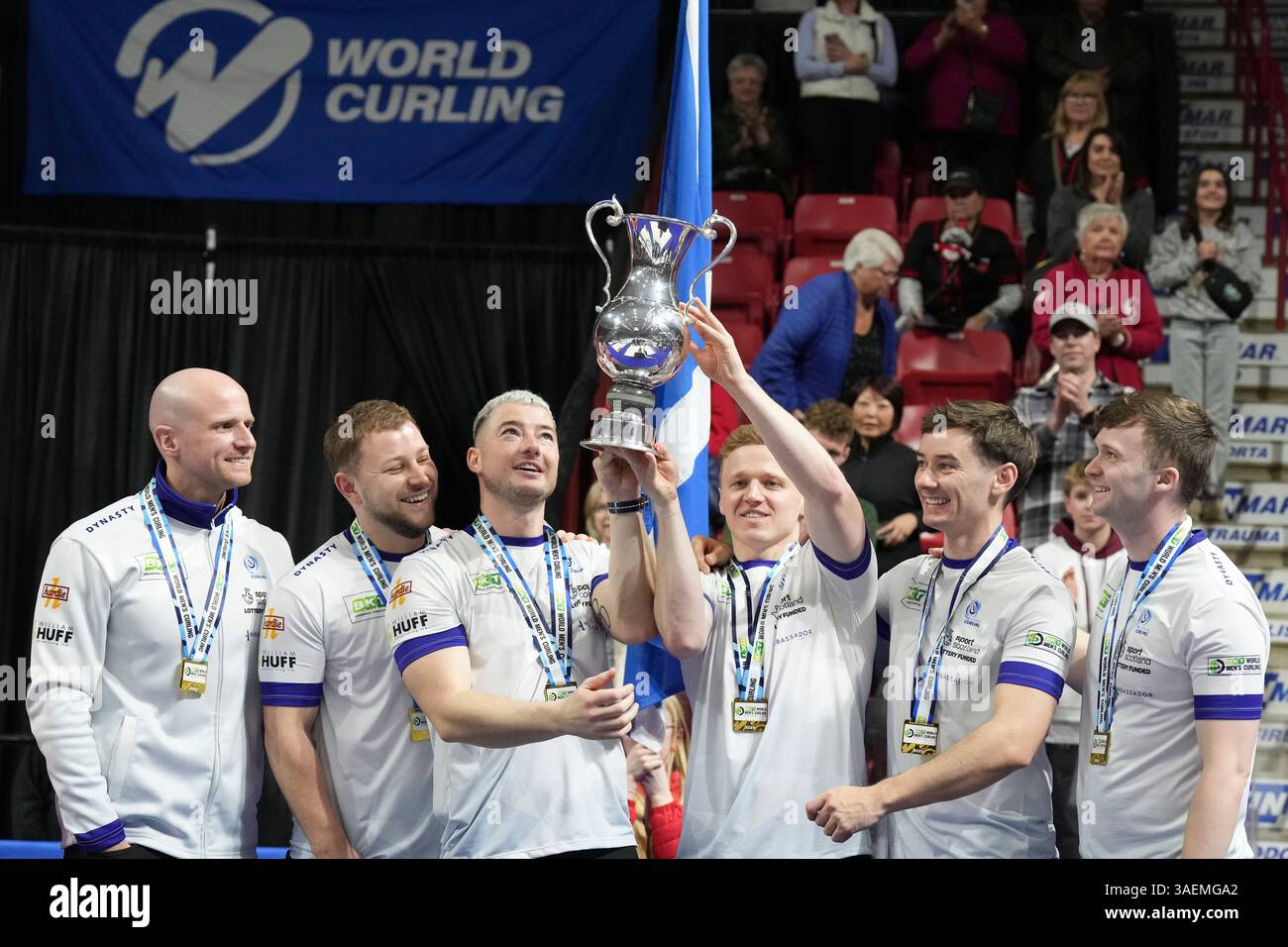 The Scotland team lifts the trophy after defeating Switzerland in the ...