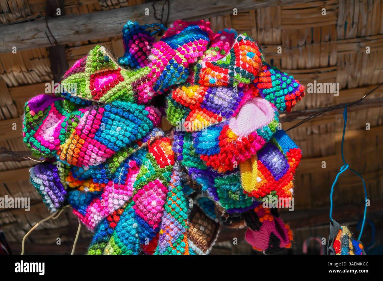 Peruvian traditional craft handmade dolls and textile. Colorful clothes ...