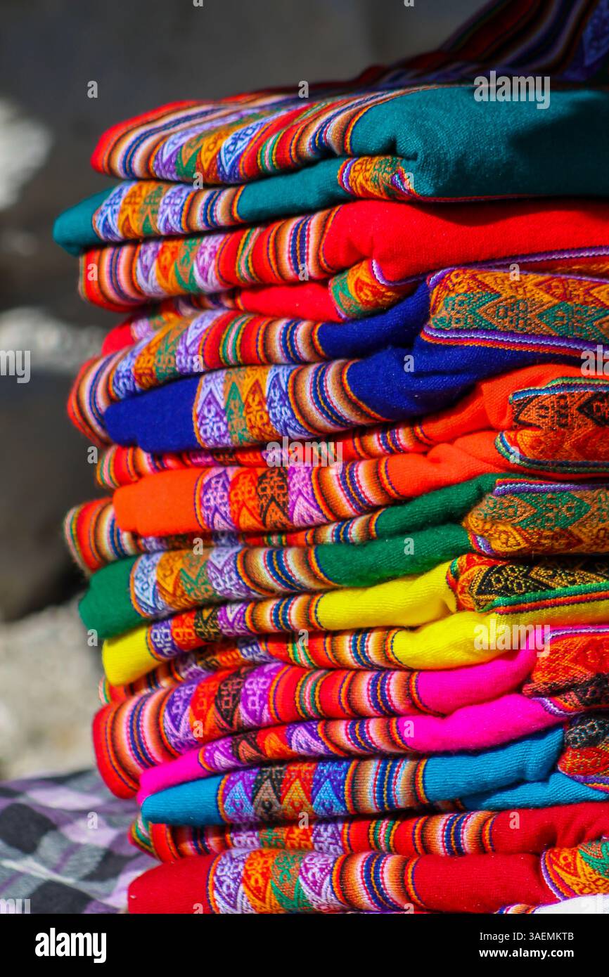 Peruvian traditional craft handmade dolls and textile. Colorful clothes ...