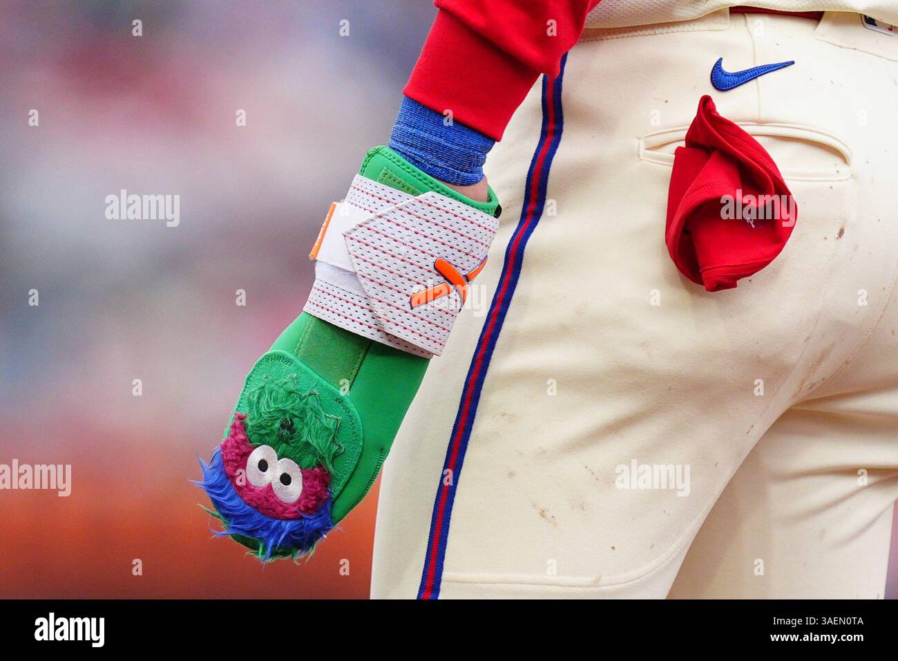 Philadelphia Phillies' Bryce Harper wears a Phillie Phanatic sliding ...