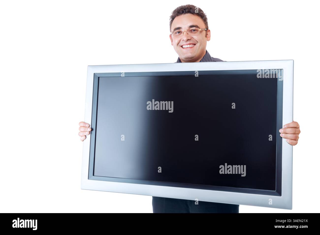 A man holding a widescreen display monitor with blank black screen ...