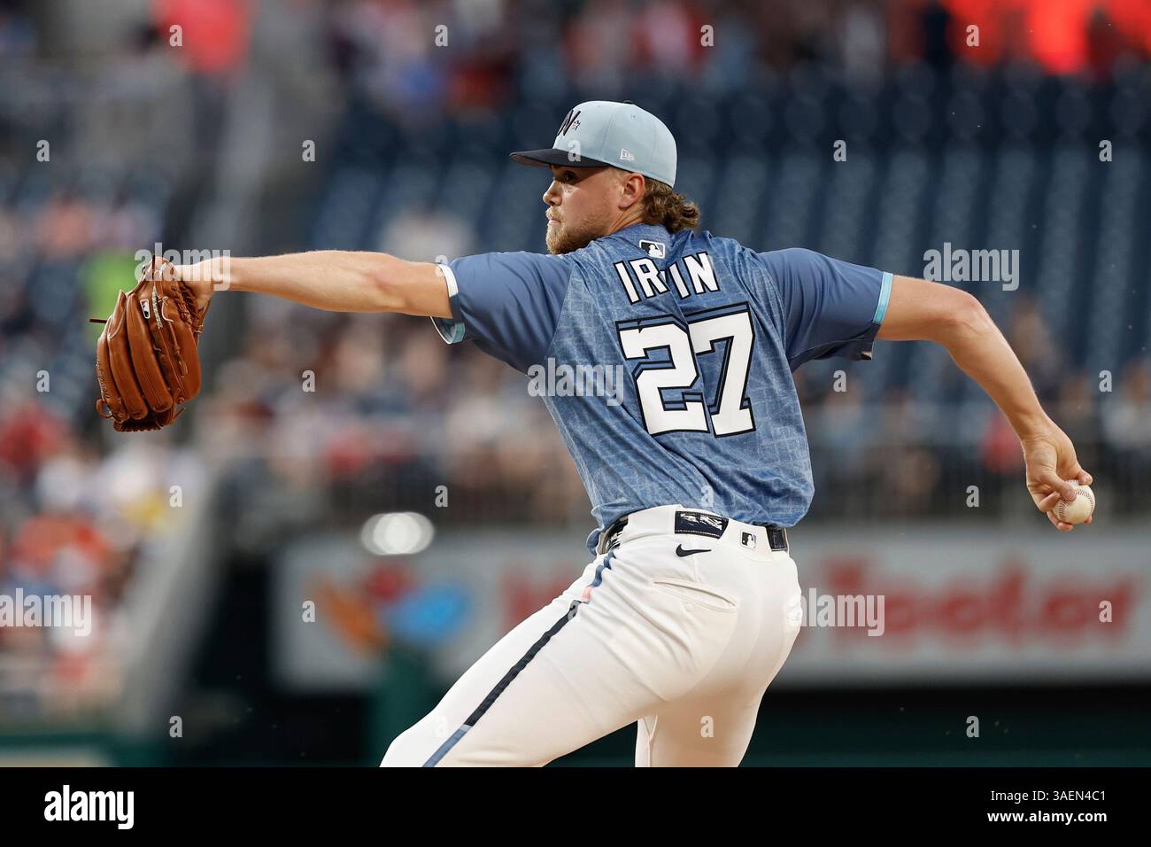 Washington Nationals pitcher Jake Irvin (27) throws during the third ...