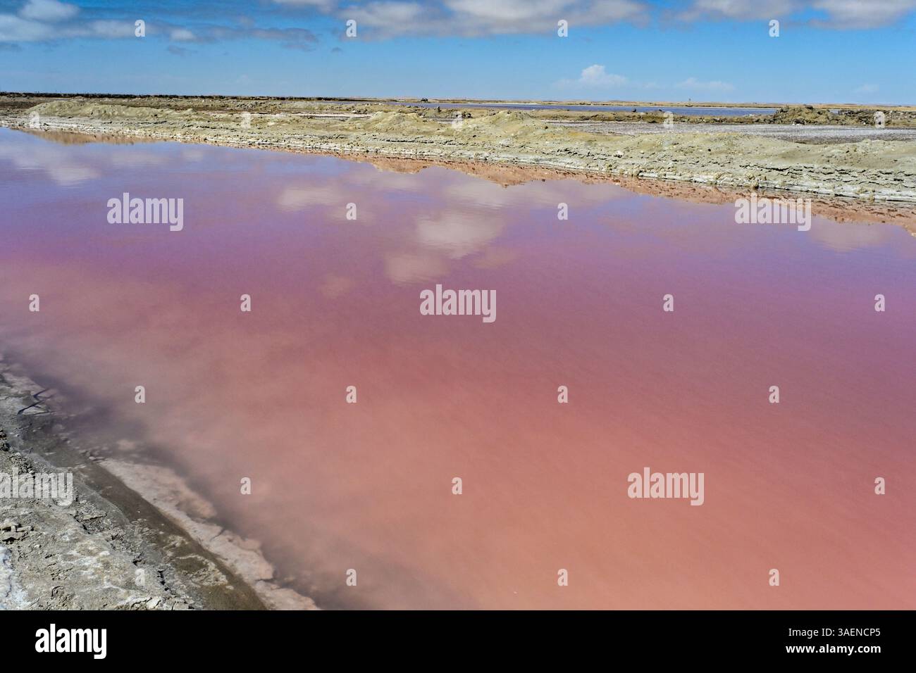 Aerial view of the striking red salt pans near Walvis Bay, Namibia. The ...