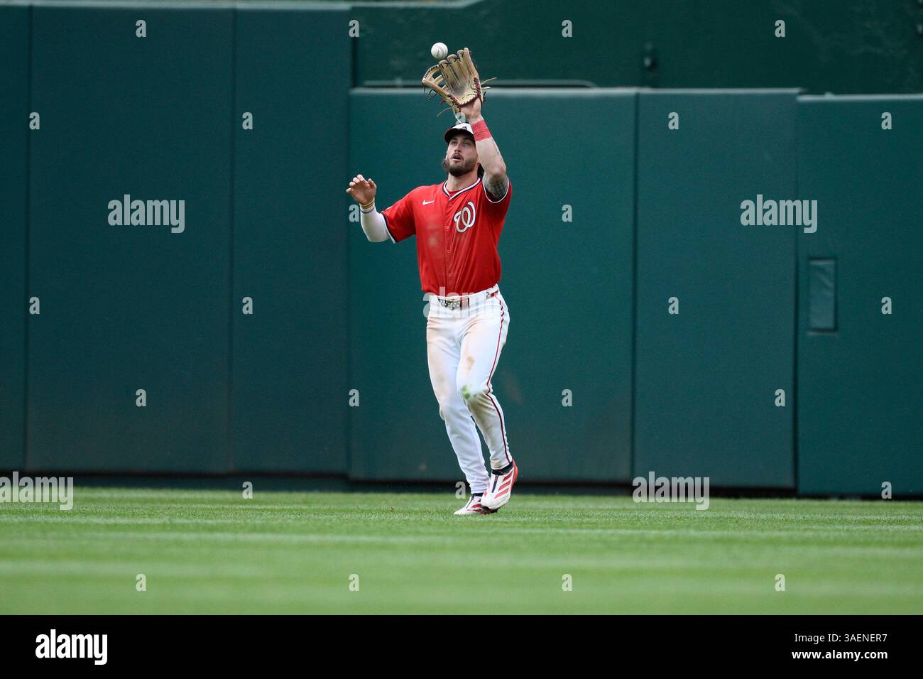 Washington Nationals center fielder Dylan Crews makes a catch on a line ...