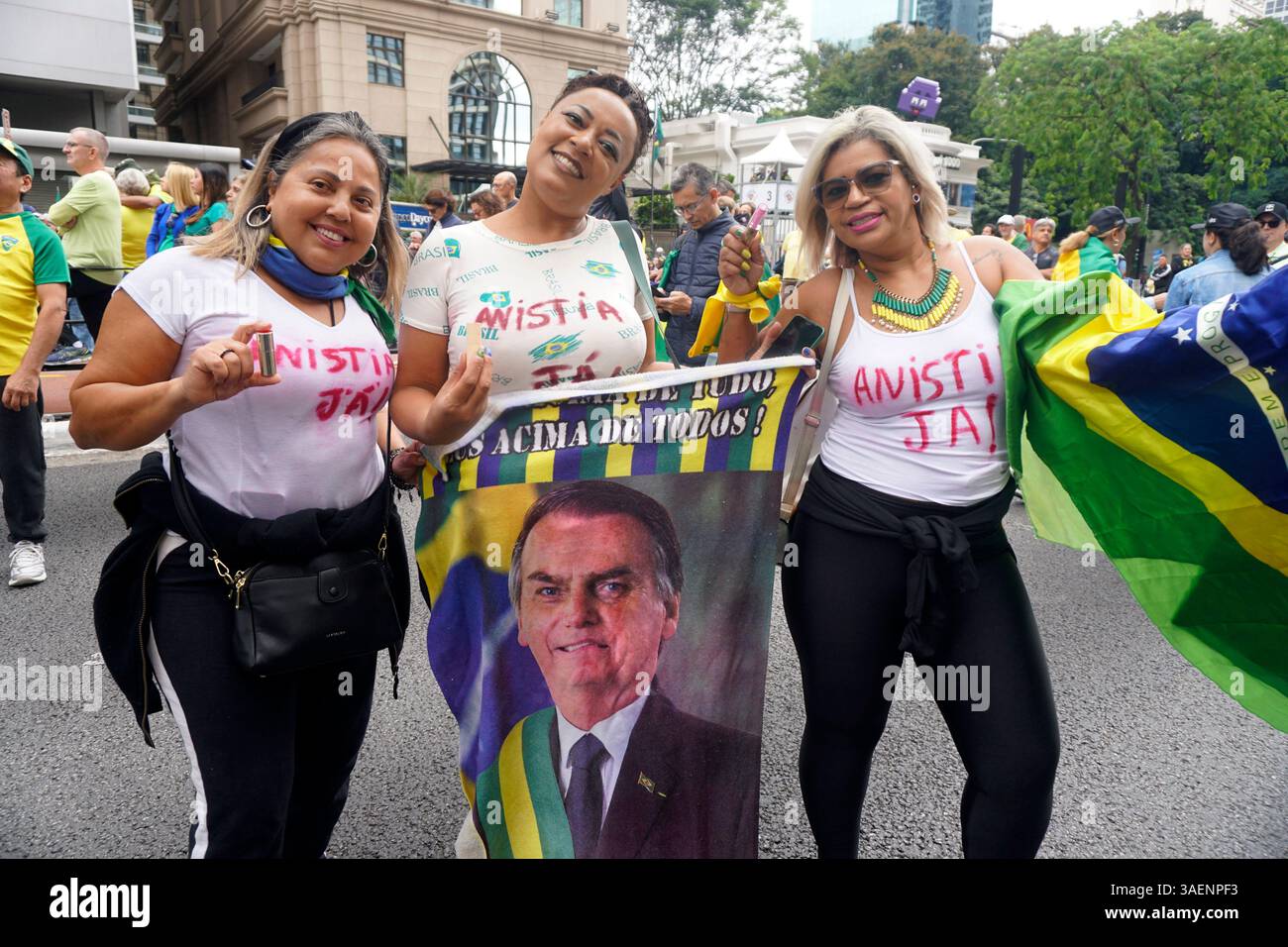 Supporters of Brazil's former President Jair Bolsonaro attend a rally at Paulista Avenue in Sao ...