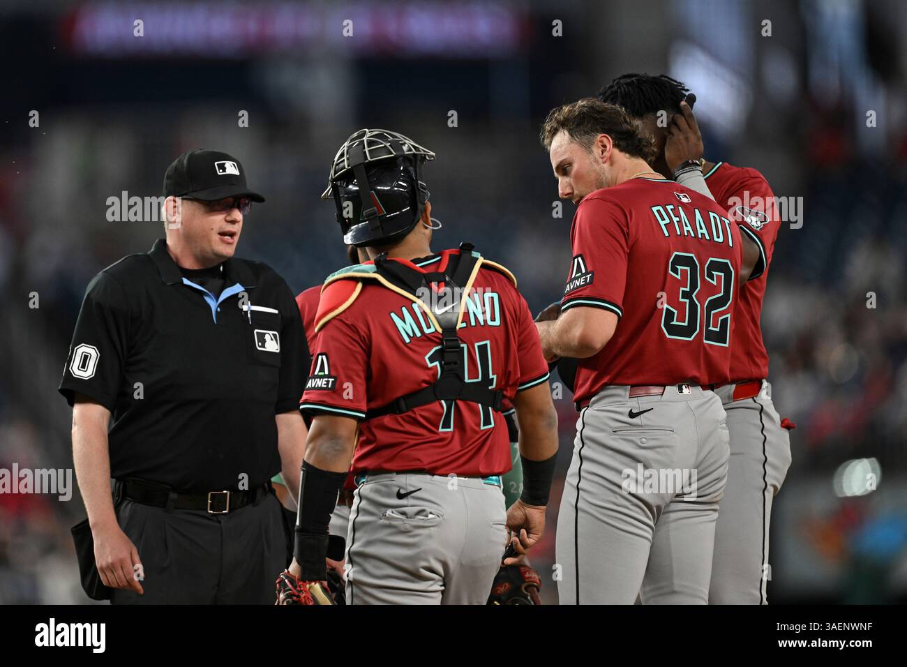 Arizona Diamondbacks pitcher Brandon Pfaadt (32) checks his PitchCom ...