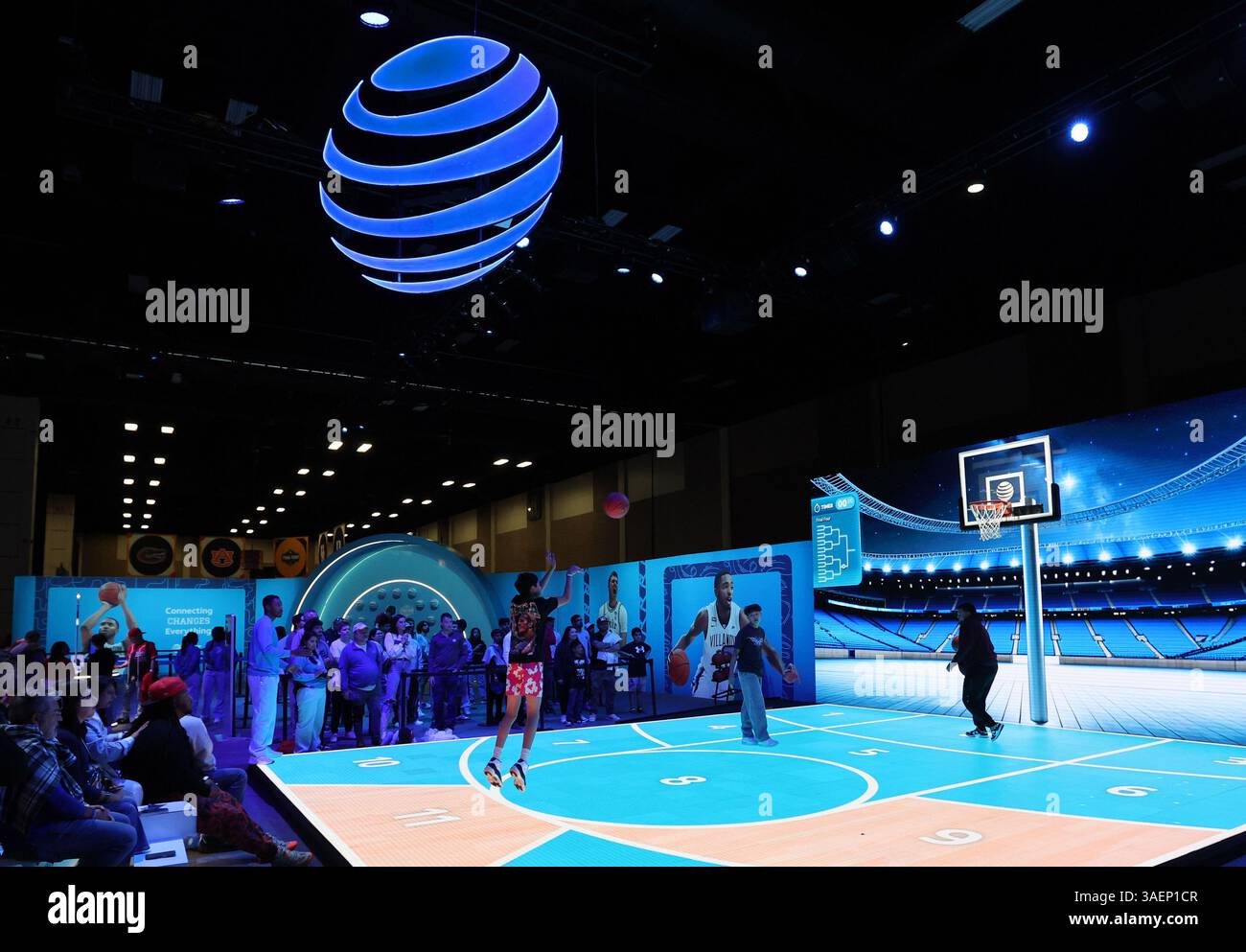 Young fans participate in a shooting contest at Fan Fest, an event for ...