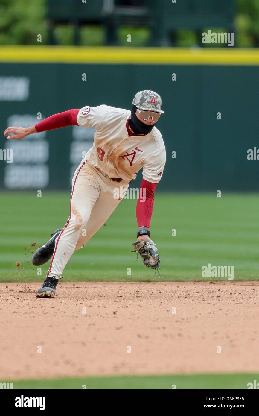 April 6, 2025: Razorback infielder Wehiwa Aloy (9) comes around a ...