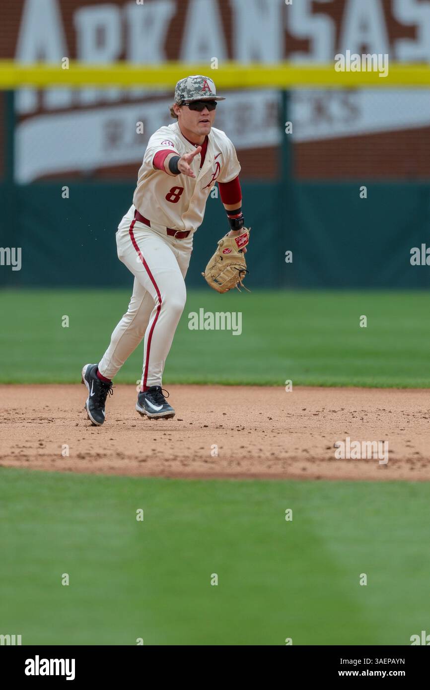 April 6, 2025: Razorback first baseman Cam Kozeal (8) follows through ...