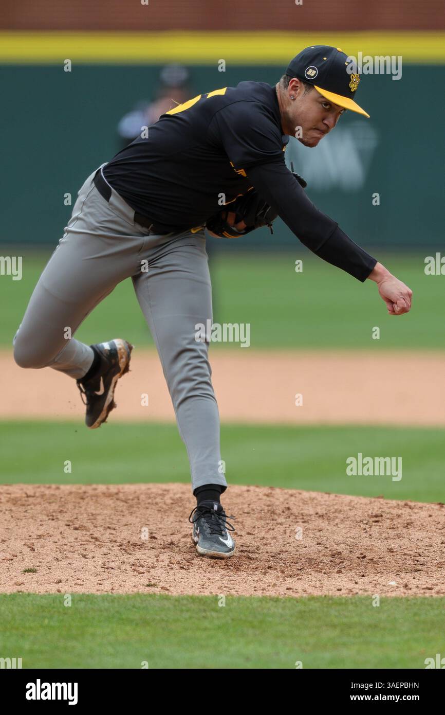 April 6, 2025: Missouri pitcher Victor Christal (26) eyes a ball as it ...