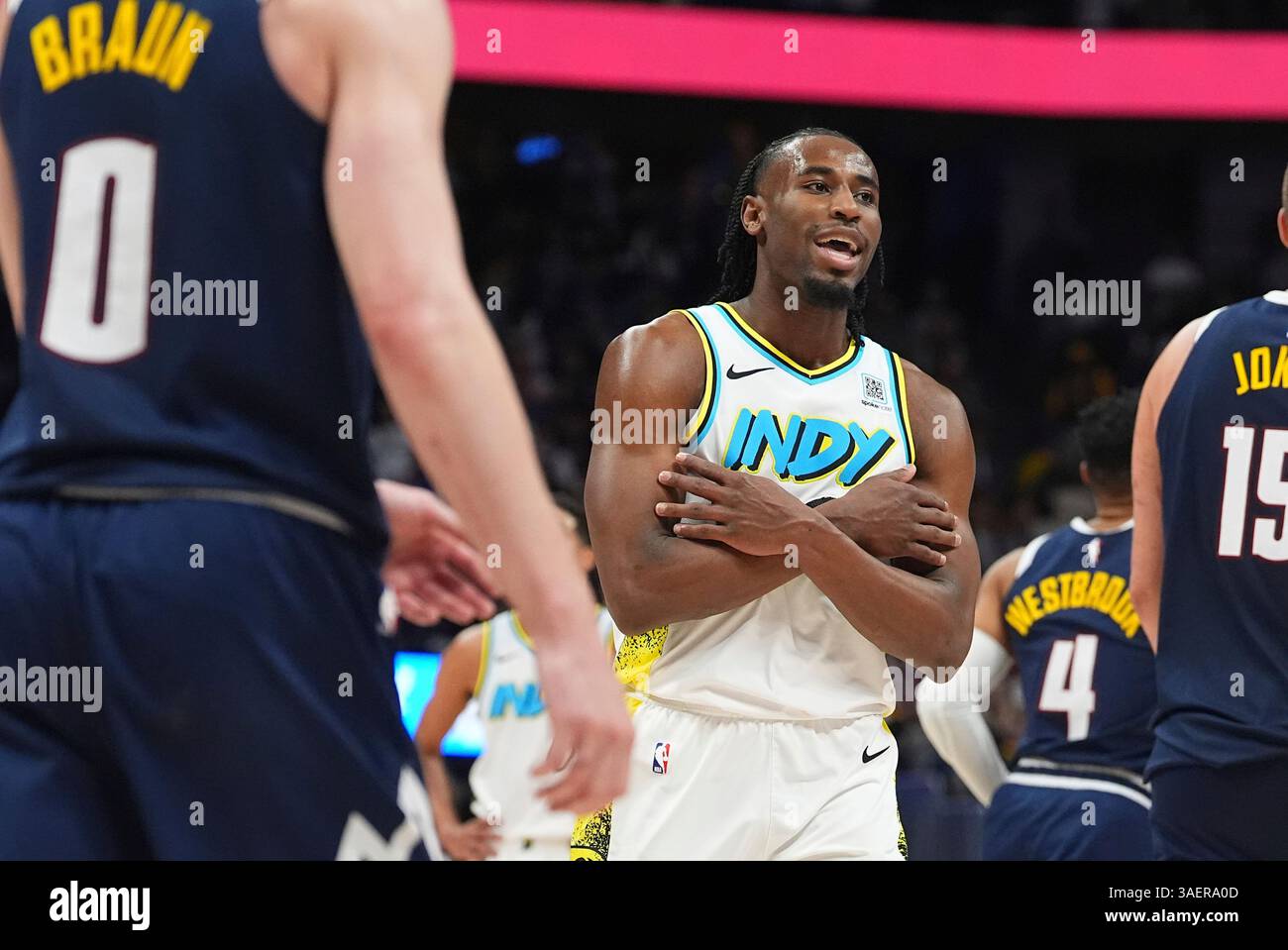 Indiana Pacers forward Aaron Nesmith heads to the bench as a timeout is ...