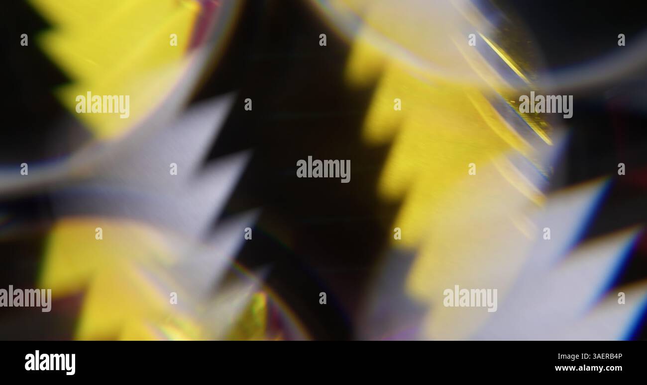 Optical ray. Blur light. Defocused yellow colorful spectrum glow laser ...