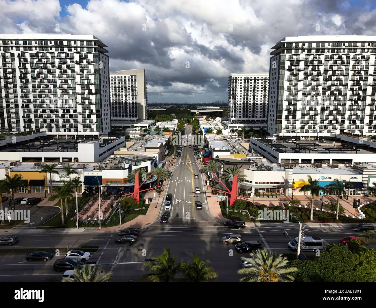 Cars pass through the area known as Downtown Doral, Saturday, April 5 ...