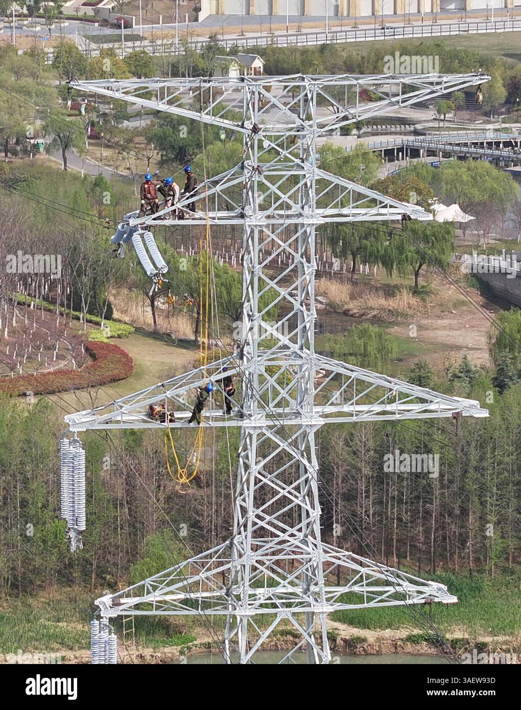 HUAI'AN, CHINA - APRIL 7, 2025 - Power workers of the State Grid ...
