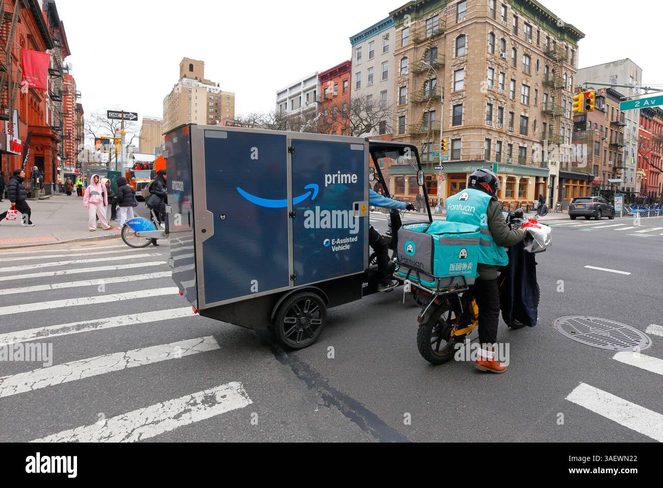 An Amazon branded umubea 4 wheel cargo ebike, a Fantuan food delivery ...