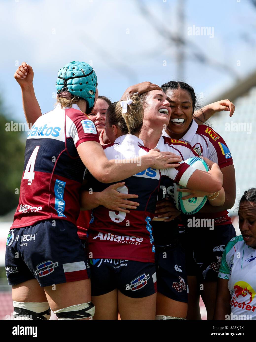 Reds players celebrate after a try was scored in the first half of the ...