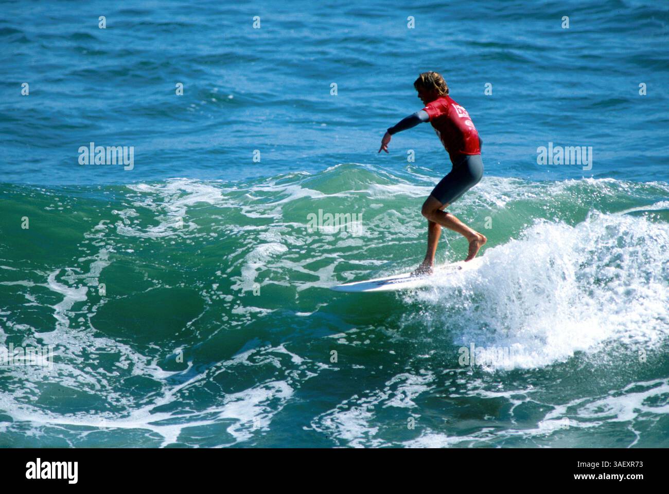 Aug 12, 1995; Huntington Beach, California, USA; Cross-stepping his way ...