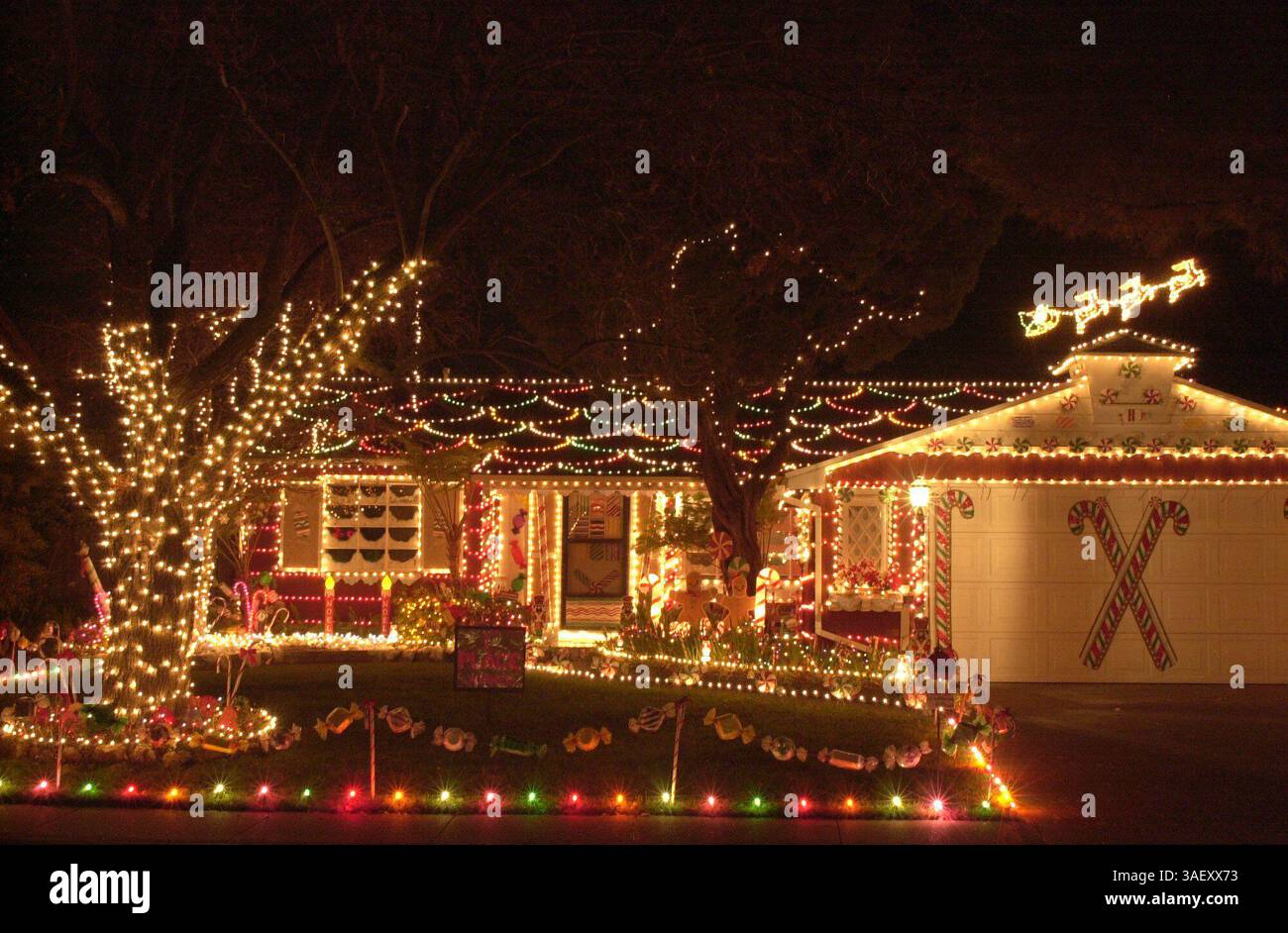 Gingerbread house at 7436 Circle Parkway with 10,000 lighs, a Necco ...
