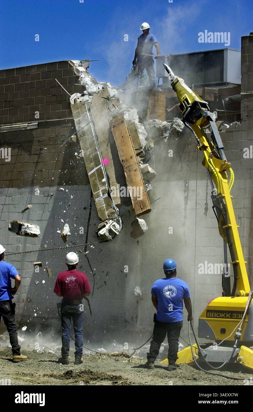 Two Rivers Demolition workers are removing a wall at an Albertson's ...