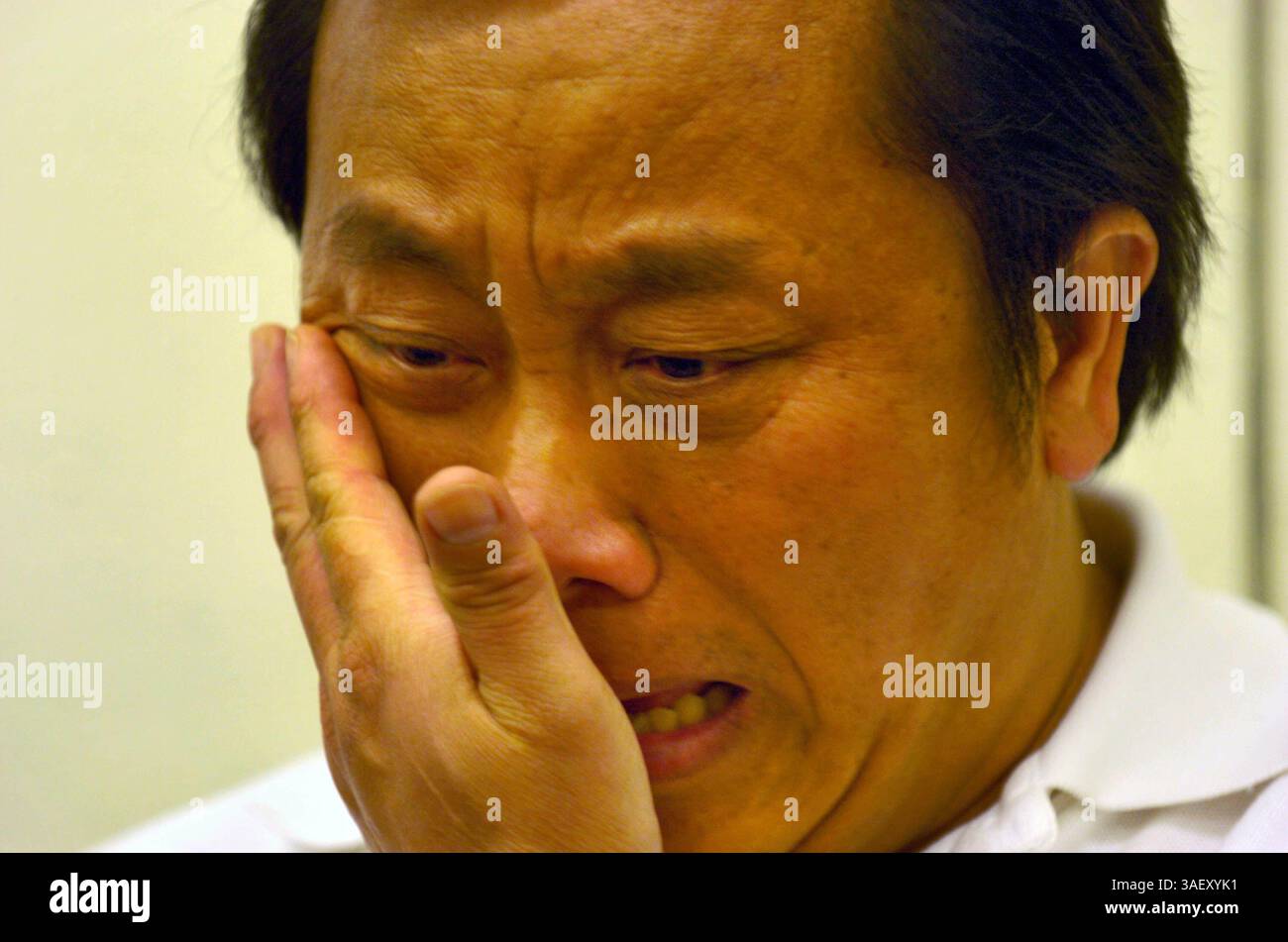 Mar 07, 2005; Sacramento, CA, USA; CHEE VANG tears up as he recalls the ...