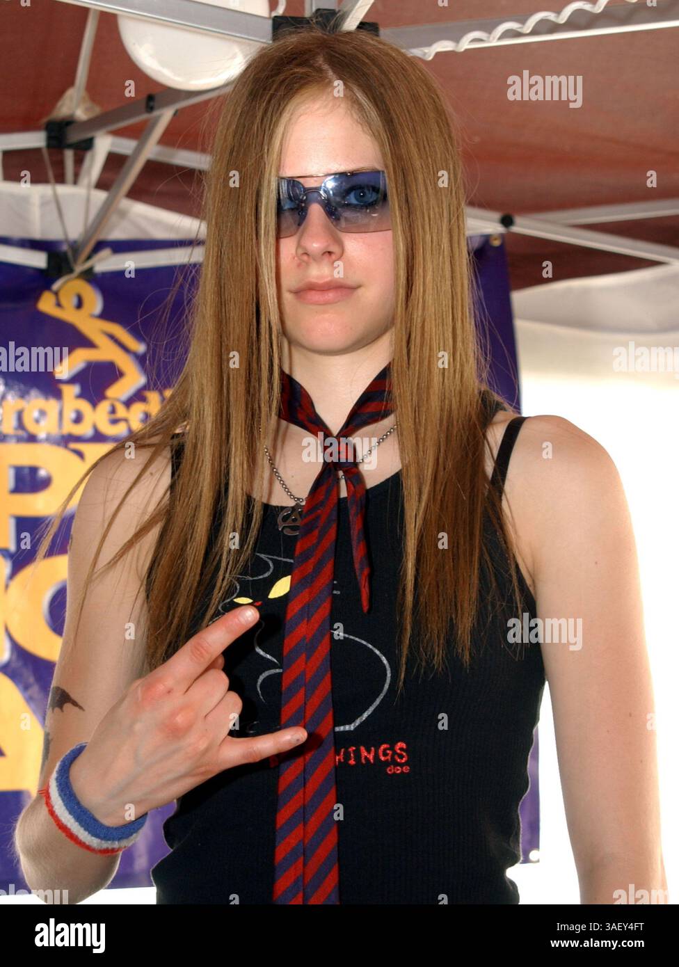 Jun 01, 2002; Mansfield, MA, USA; Singer AVRIL LAVIGNE backstage at the ...