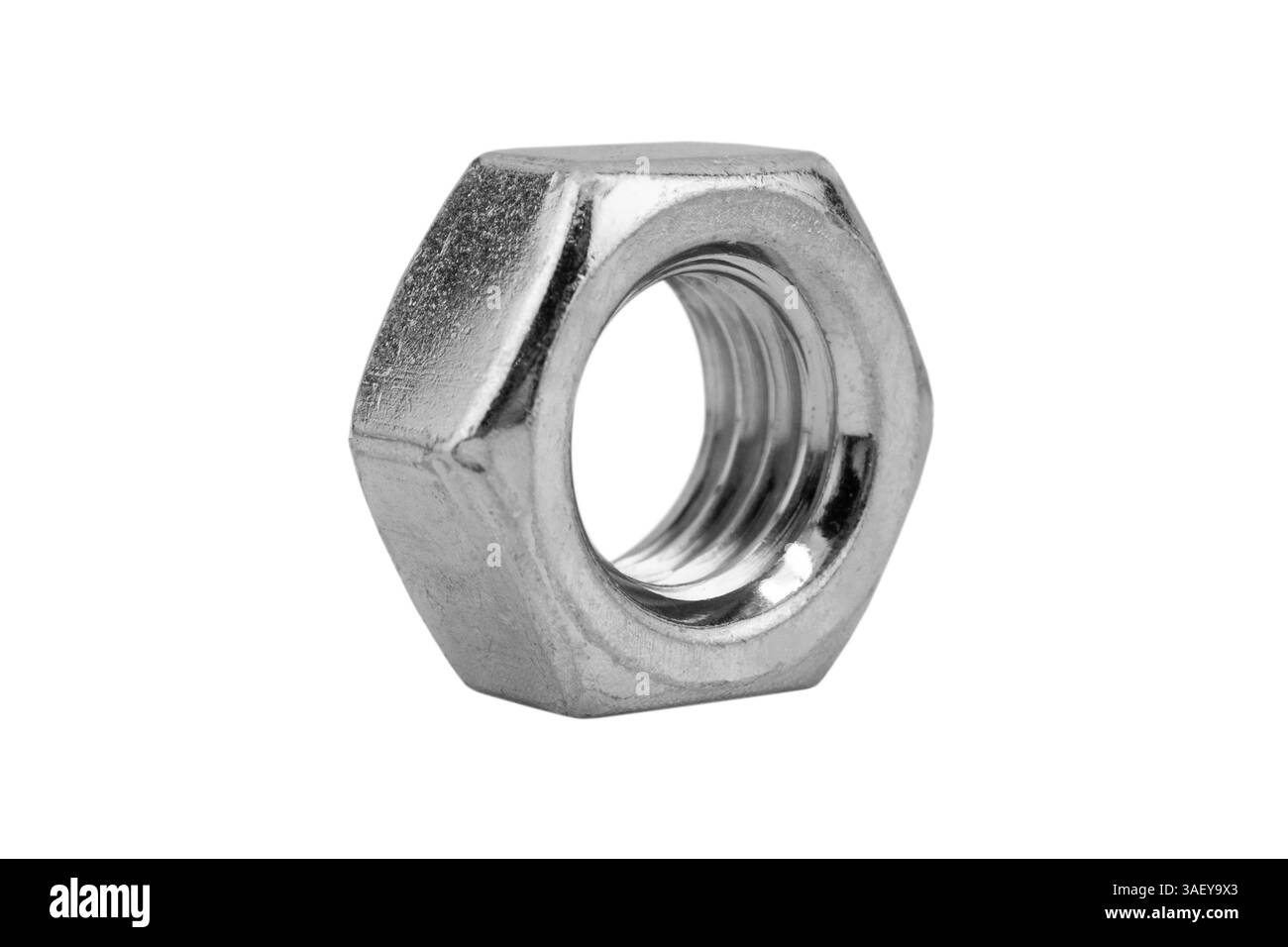 Macro shot metal nut isolated on white background. Chromed screw nut ...
