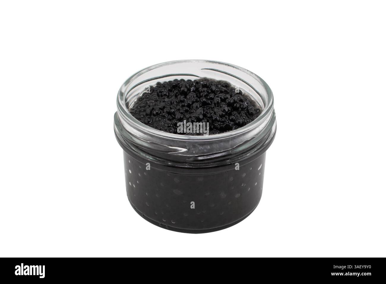 Black caviar in glass jar container isolated on white background Stock ...