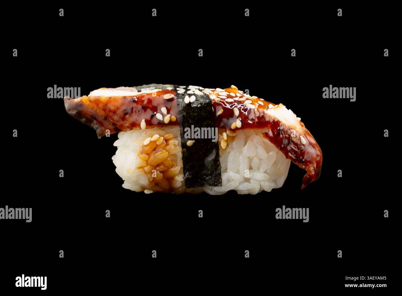 Delicious Unagi Eel Nigiri. Eel Sushi nigiri sushi isolated on black background. Eel sushi ...
