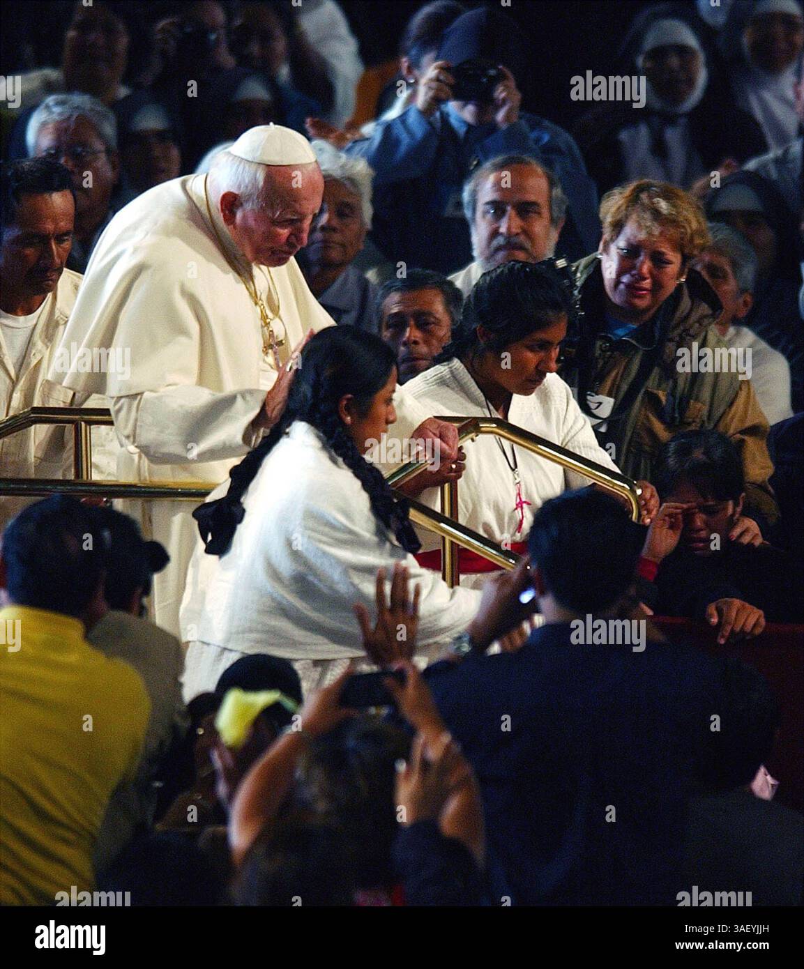 Aug 01, 2002; Mexico City, MEXICO; POPE JOHN PAUL II places his hand on ...