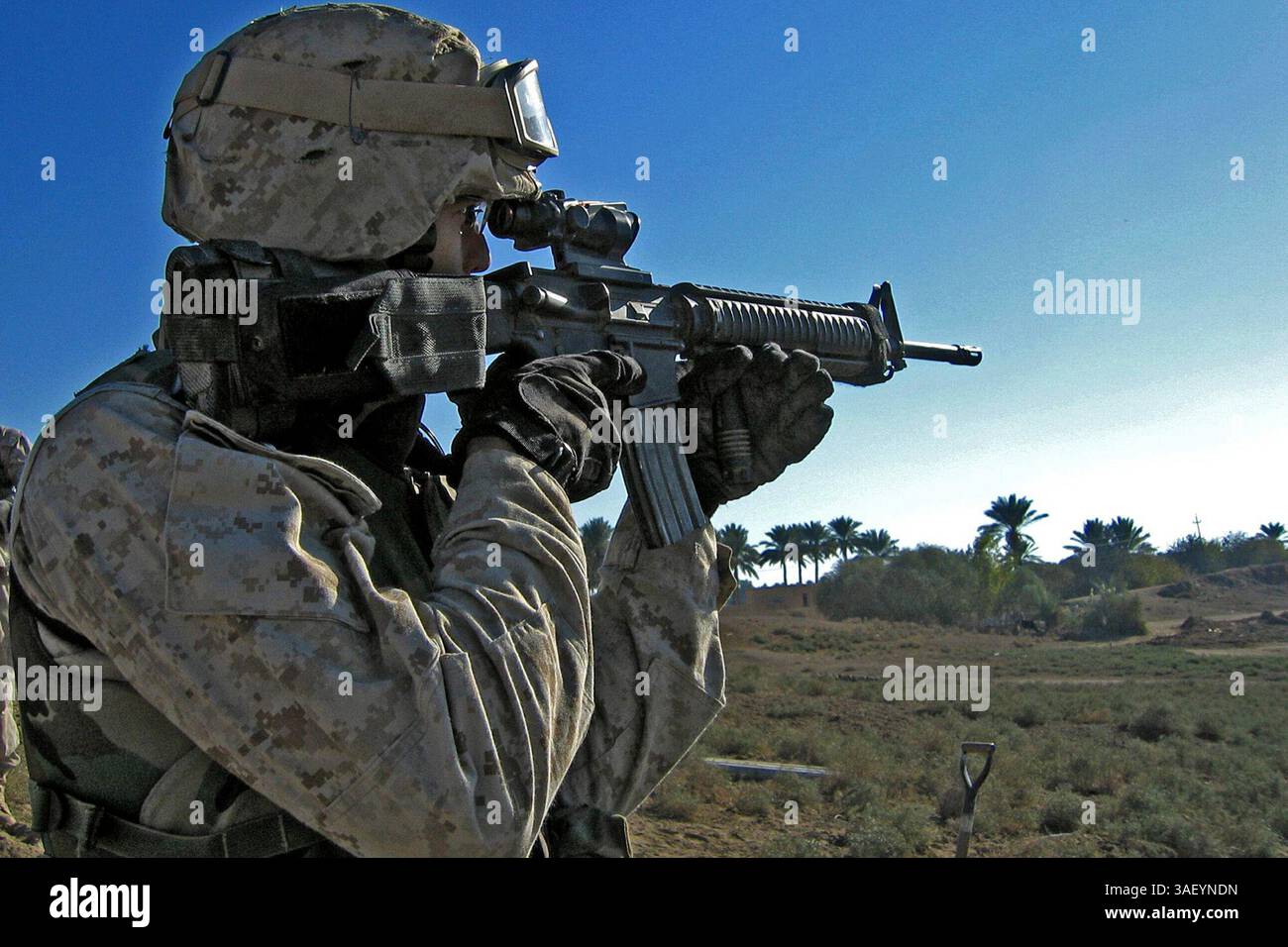 Dec 07, 2004; Yusufiyah, Iraq; A Marine attached to the 24th Marine ...