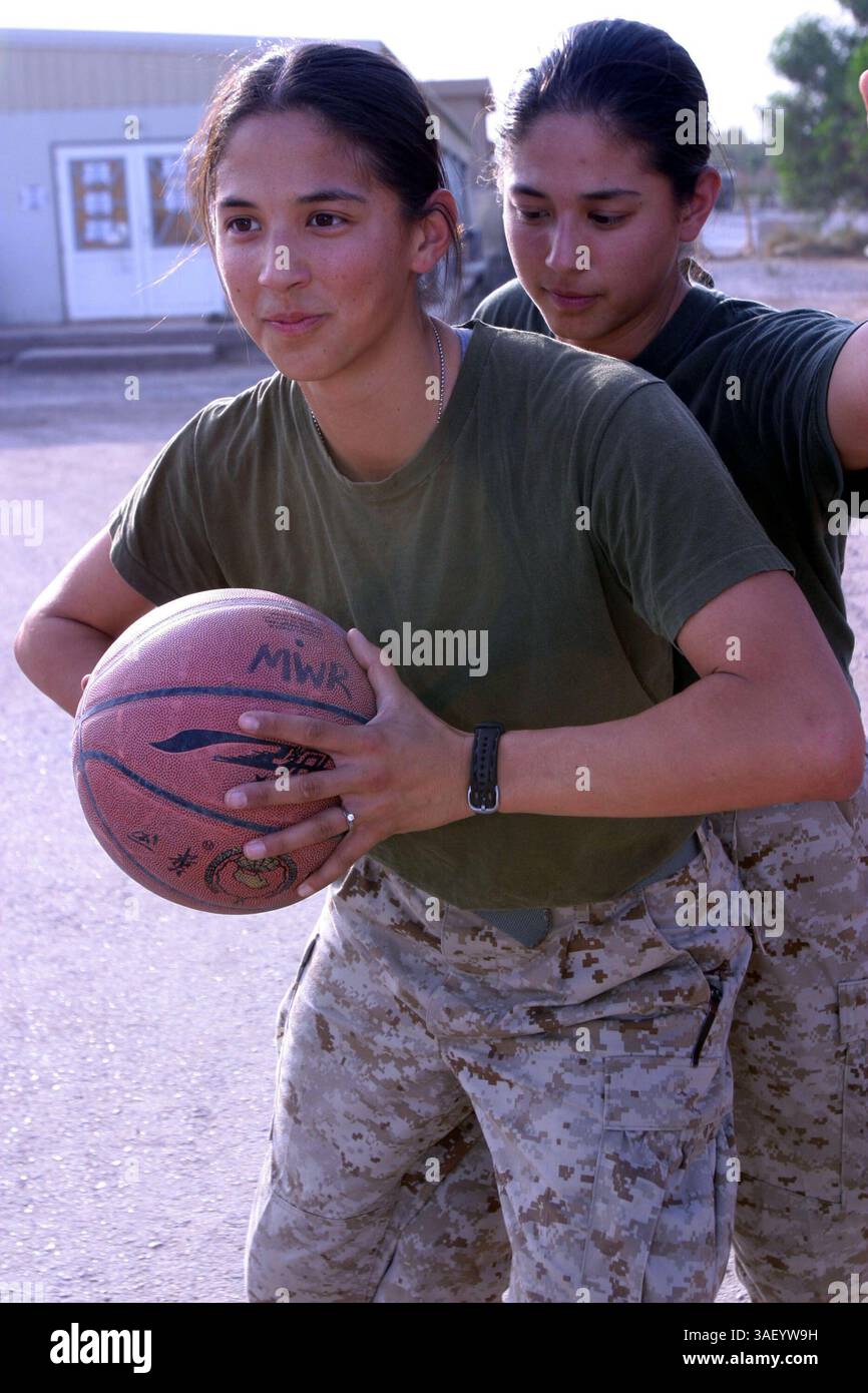 Oct 14, 2004; Camp Flea, Iraq; 1st Lt. JENNIFER J. RYU, 24, left, with ...