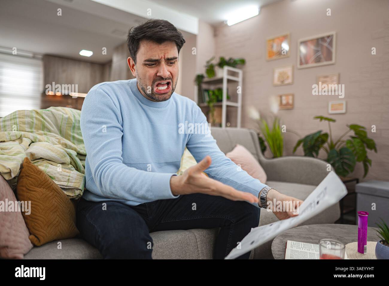 Angry man holding lit hi-res stock photography and images - Alamy