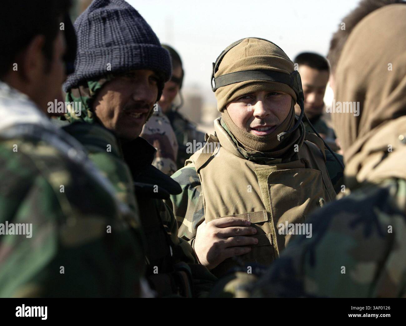 Dec 17, 2004; Camp India, Iraq; While waiting for a fuel truck team to ...